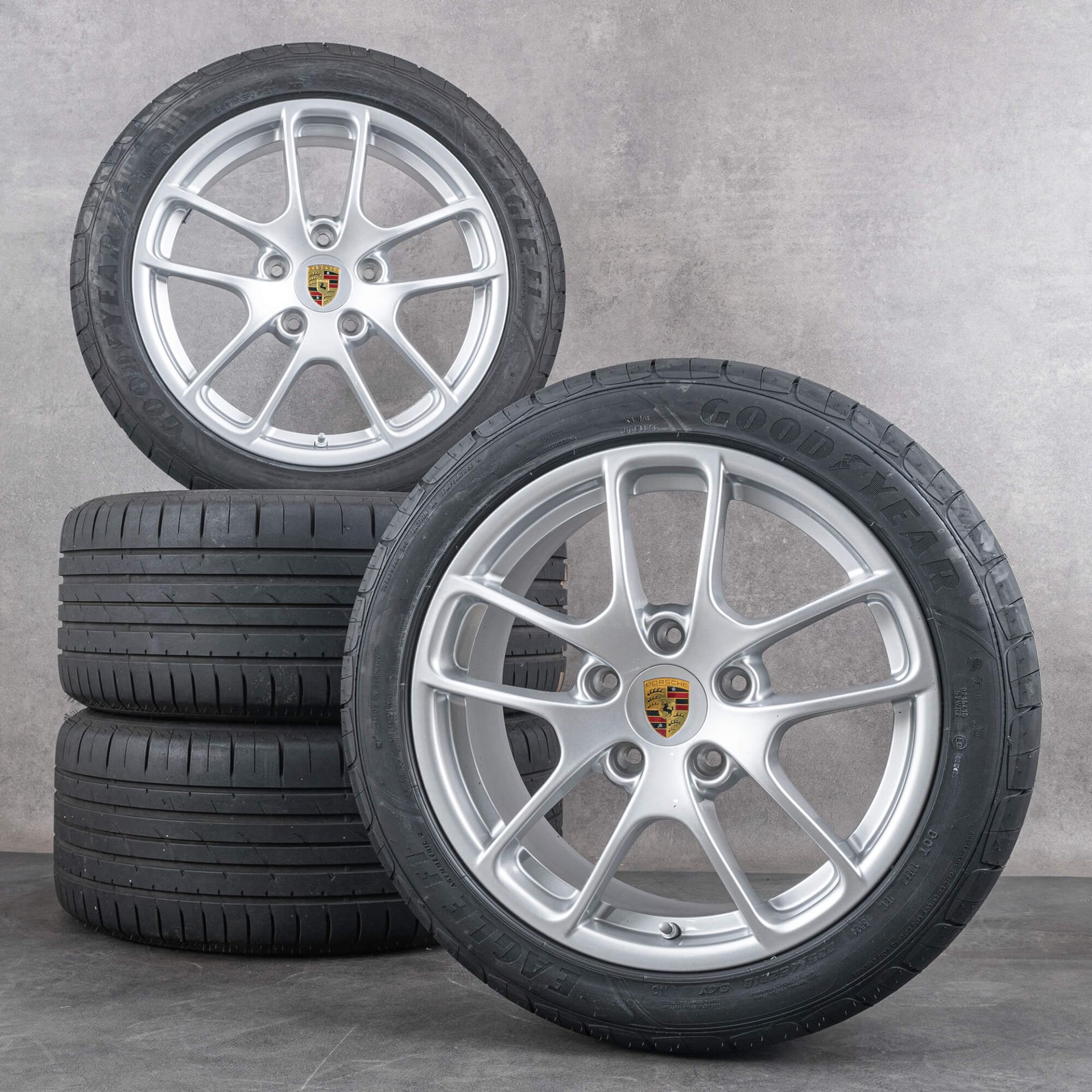 OEM Porsche Boxster Cayman 718 snow tire packages 18 inch 982 rims ...